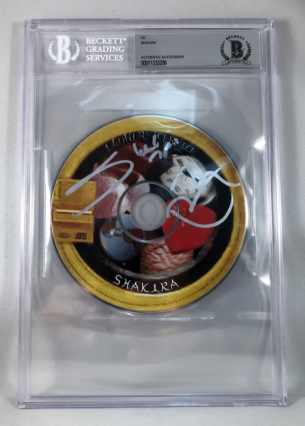 Shakira Signed CD Laundry Service Beckett BAS - Memorabilia For Less
