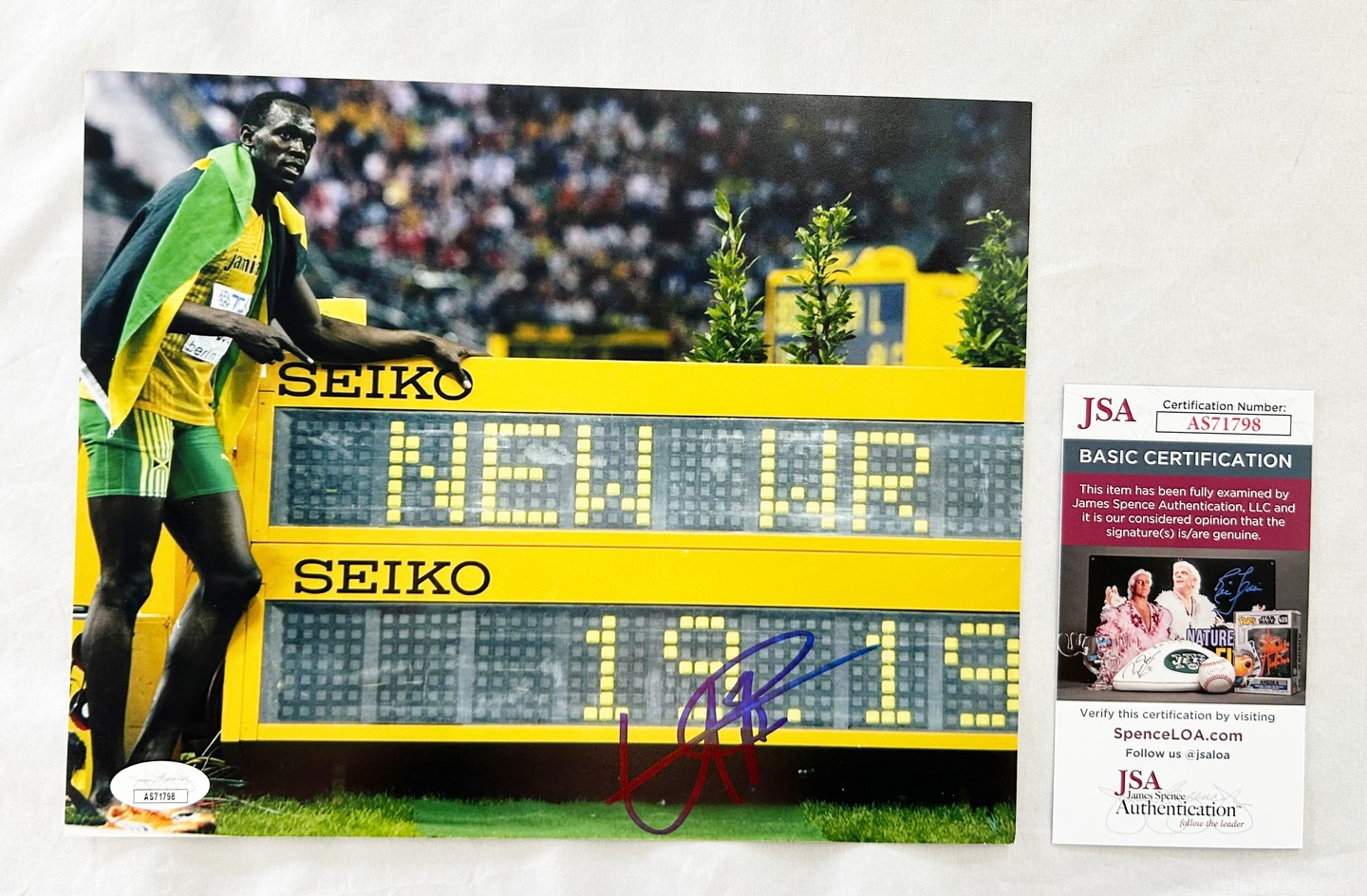 Usain Bolt Signed 8x10 Olympics Gold Photo JSA - Memorabilia For Less